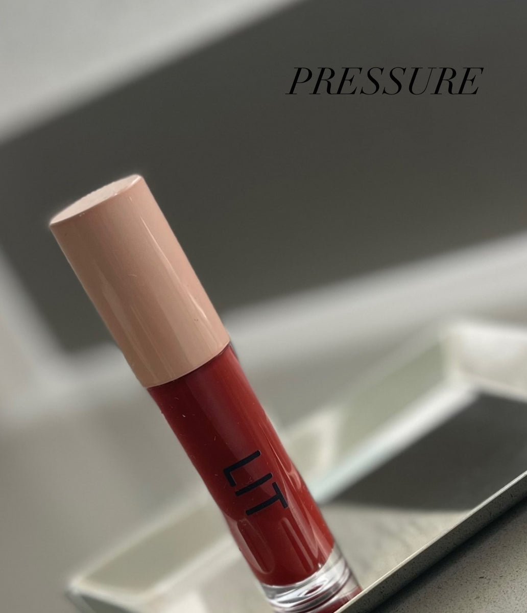 "PRESSURE" LIT GLOSS
